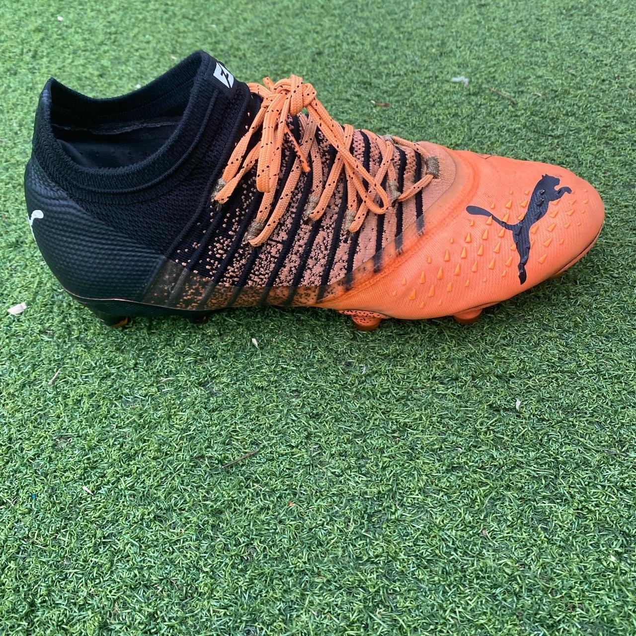 Orange and black puma future z1.1 firm ground... - Depop