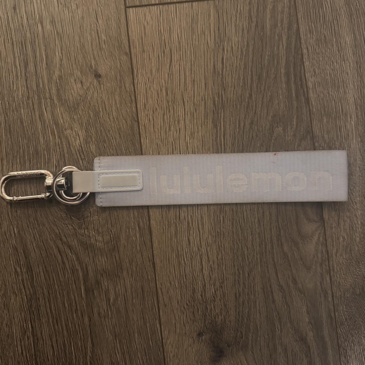 Light Blue lululemon keychain. Cute but dirty, could... - Depop