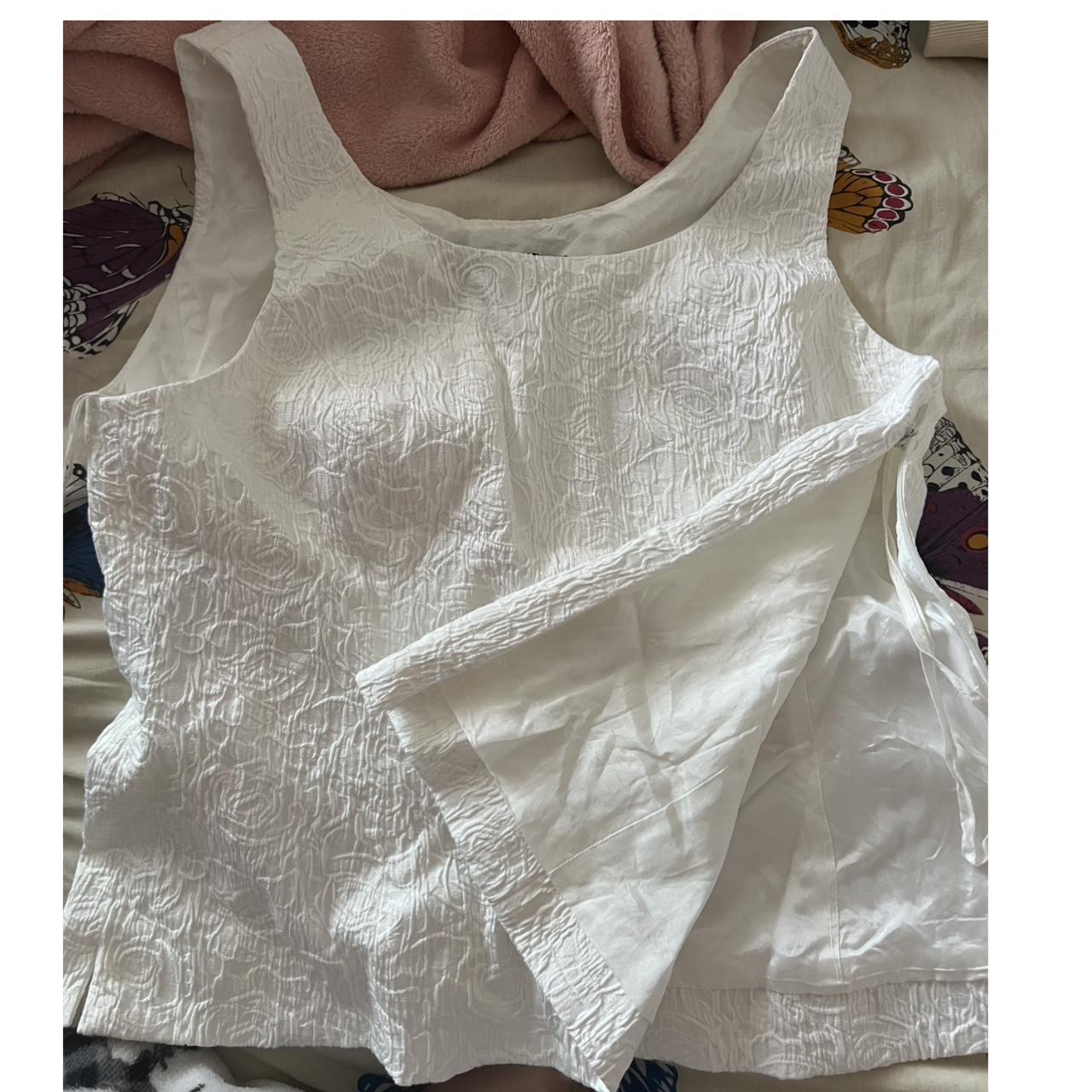 Vintage Kasper brand white tank top with a rose... - Depop