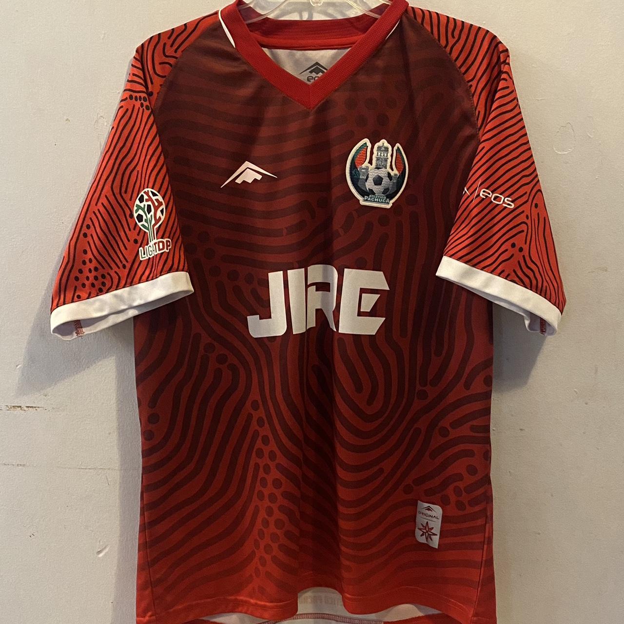 Red soccer jersey with wavy pattern. Men’s size xl.... - Depop