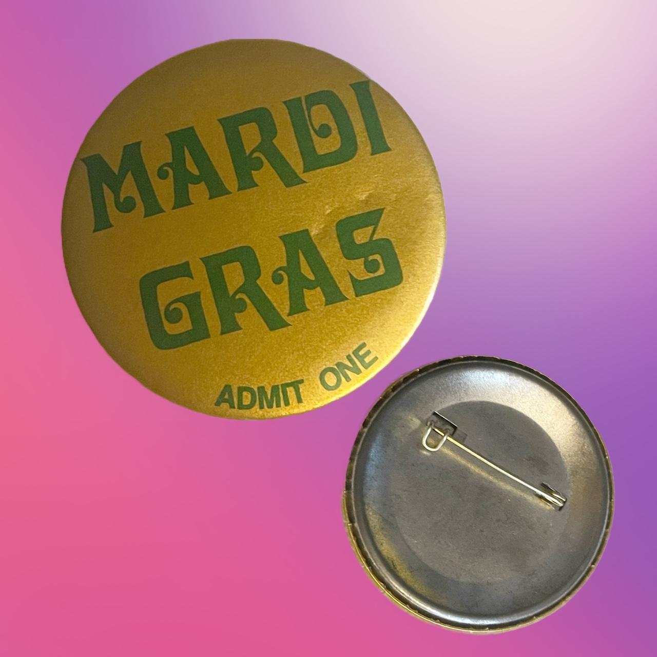 golden mardi gras pin, open to... - Depop