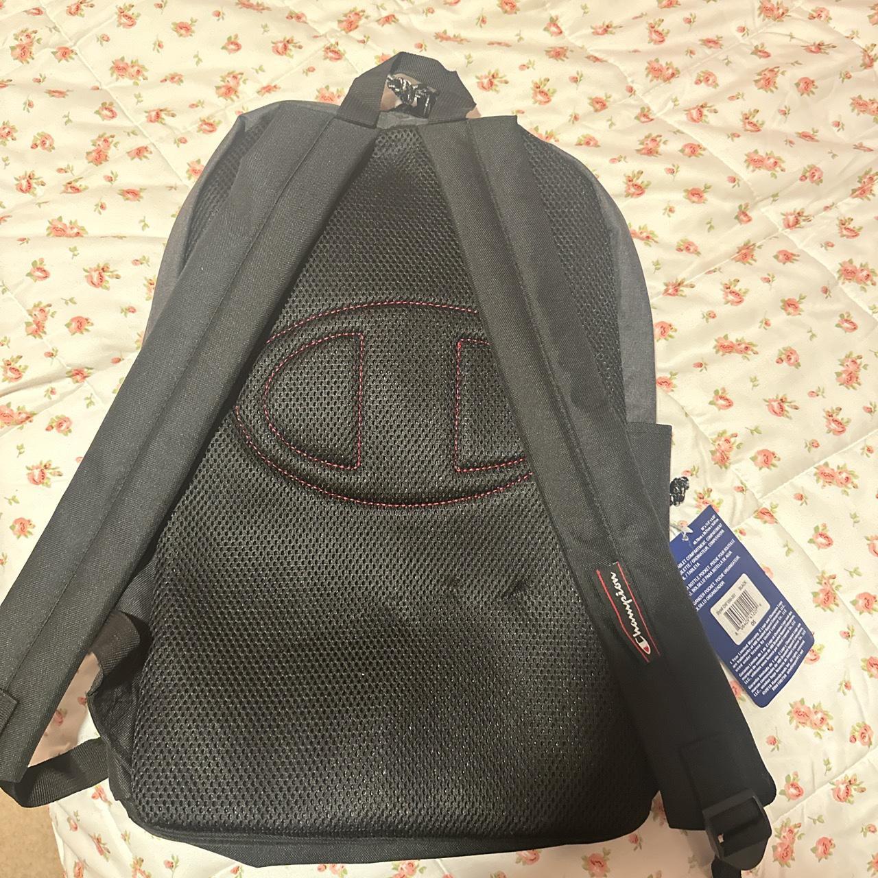 brand new black champion backpack has two main... - Depop