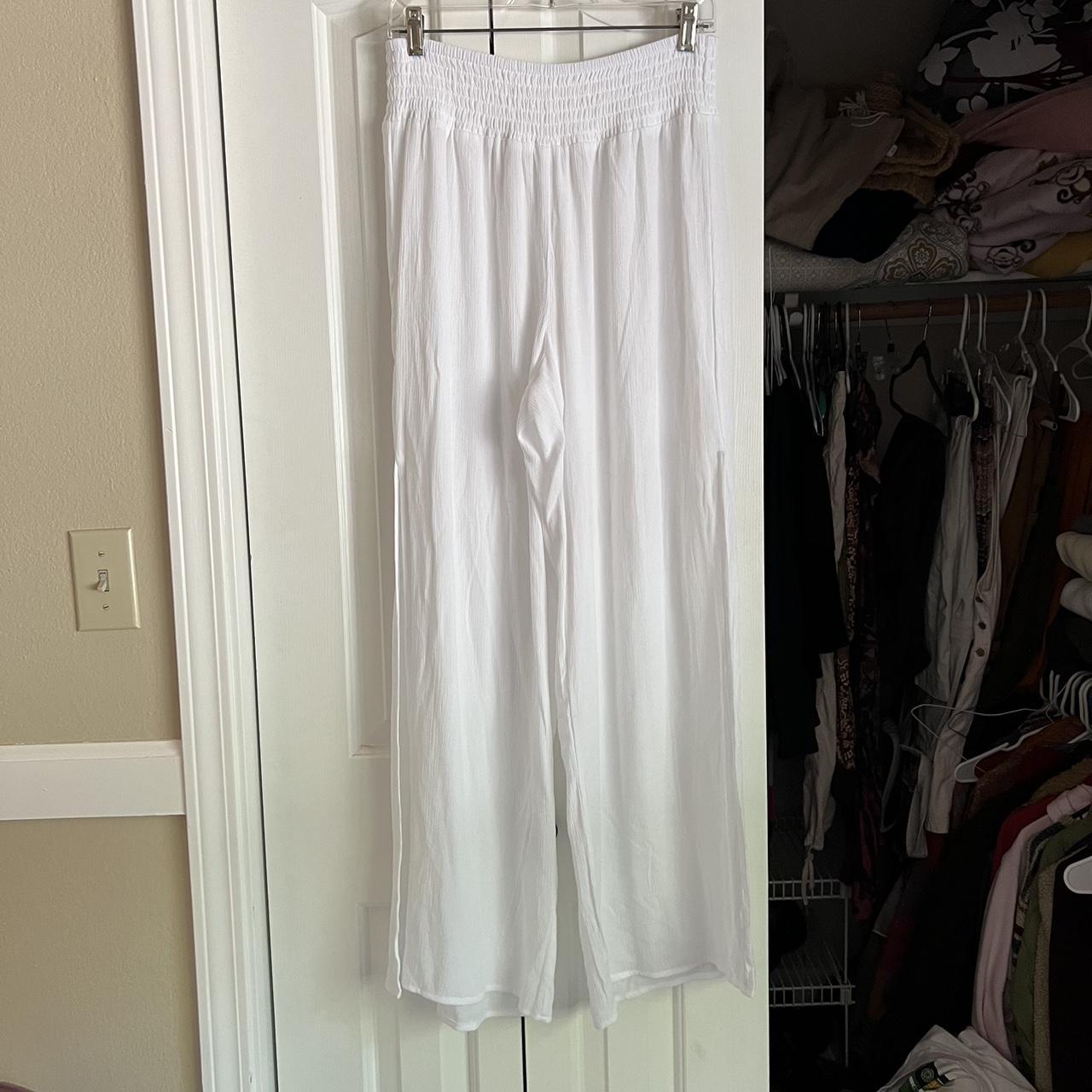 the cutest white flowy pants! fits me full length... - Depop