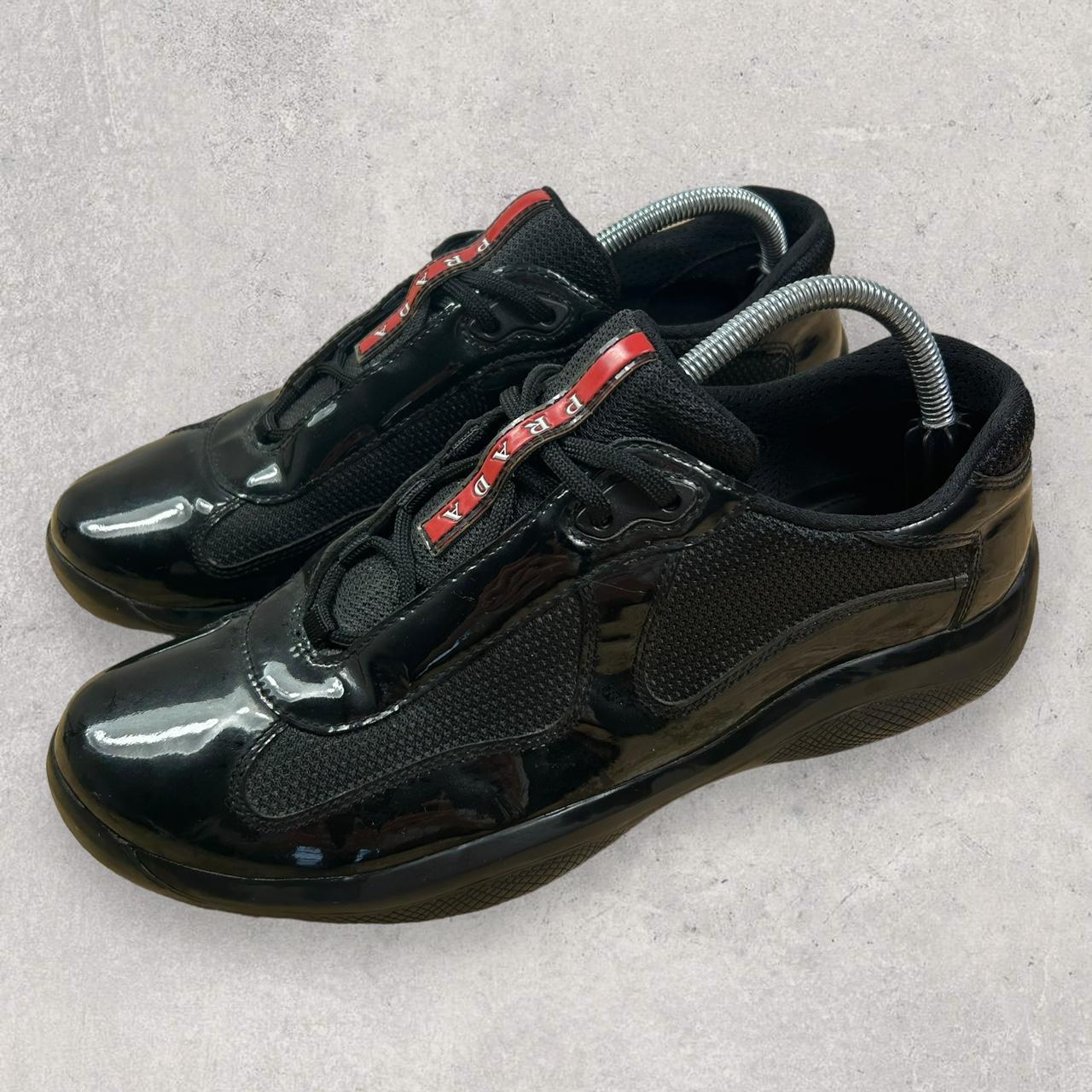 Prada America’s Cup black low-top patent leather... - Depop
