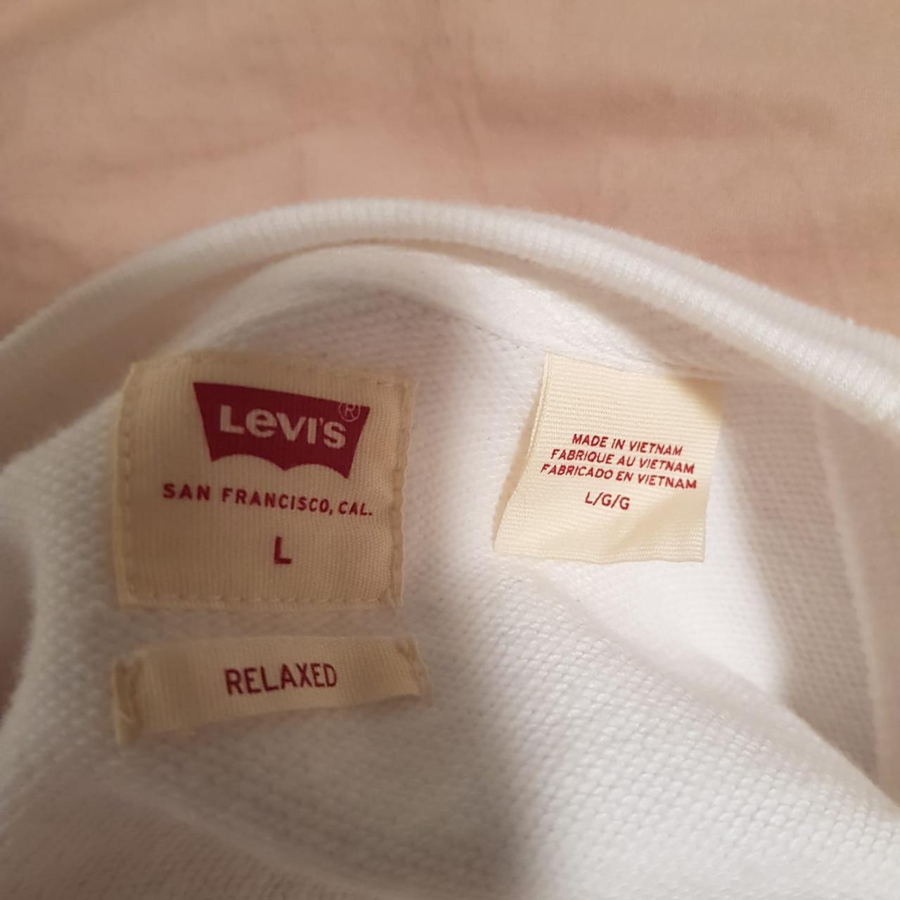 White Levi's Pride Jumper with rainbow details.... - Depop