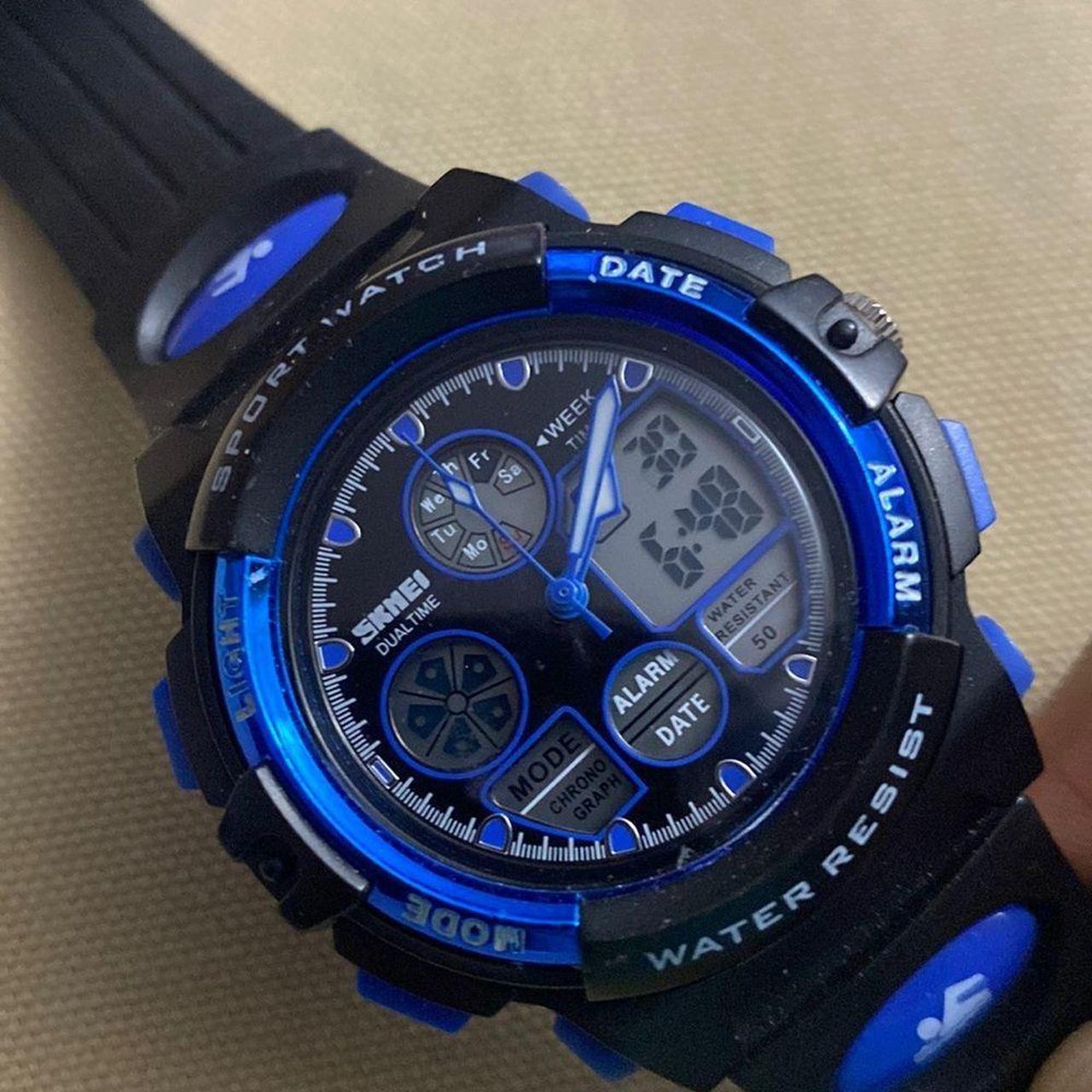 Casio Men's Blue and Black Watch | Depop