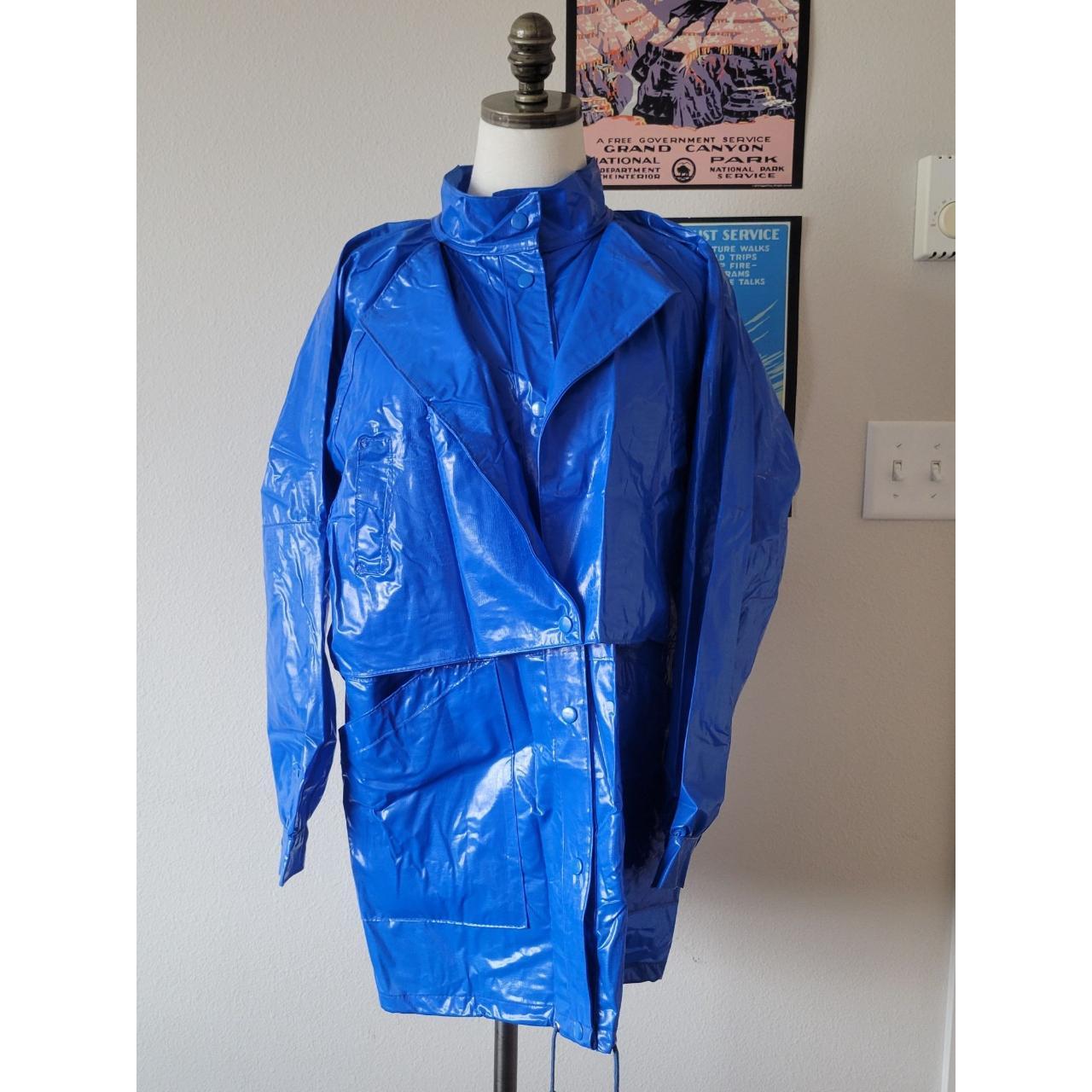 Bright blue rain jacket with layered front, mock... - Depop