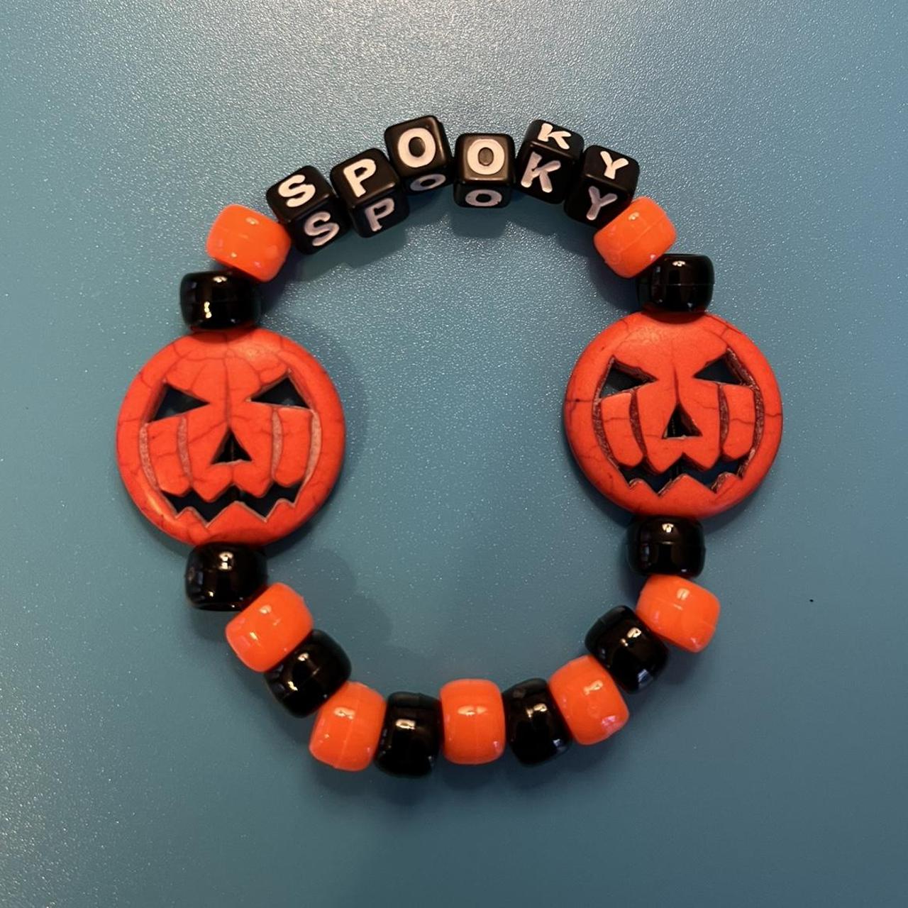 “Spooky” orange and black Halloween Kandi bracelet... - Depop