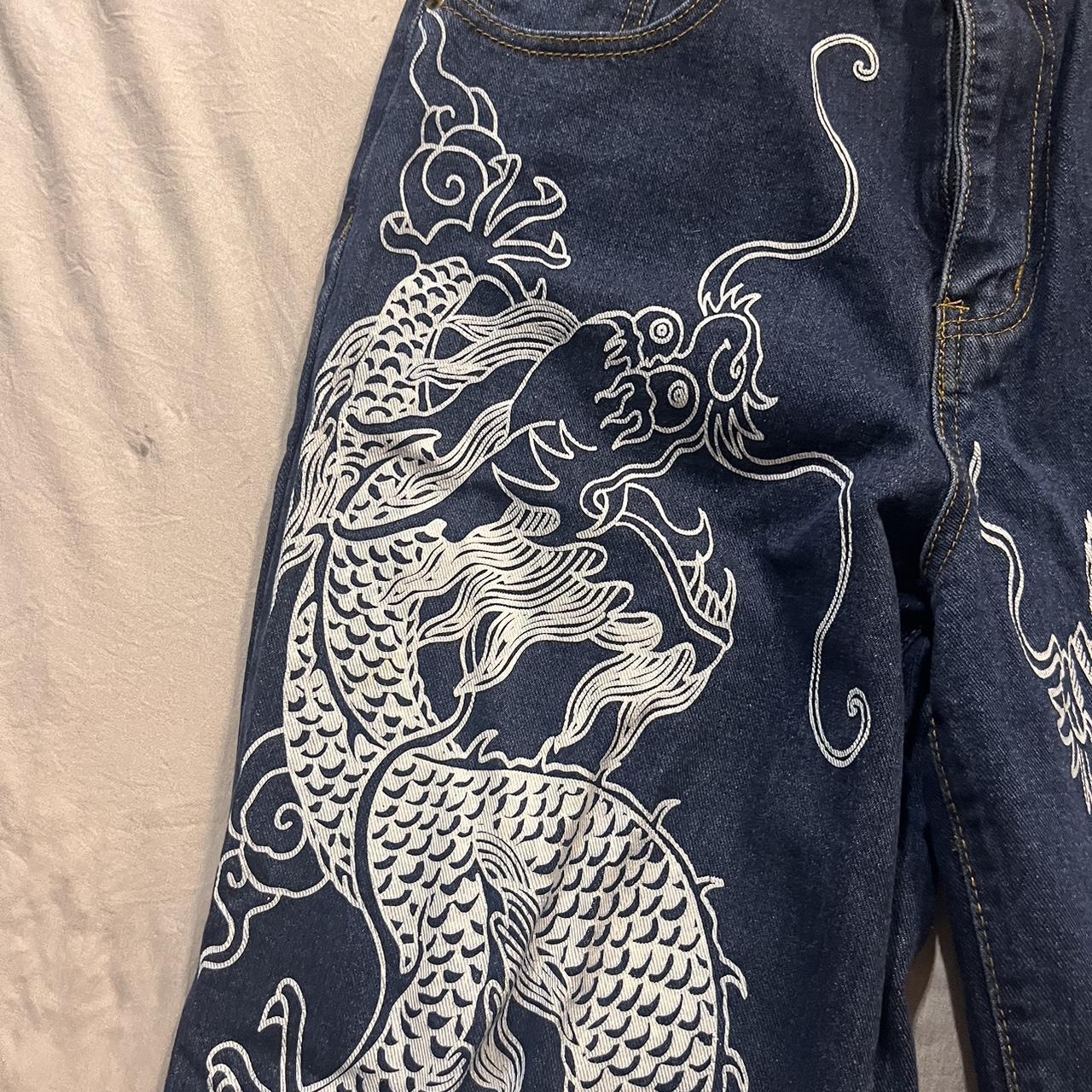 L/XL Baggy Dragon graphic jeans. mid waisted in good... - Depop