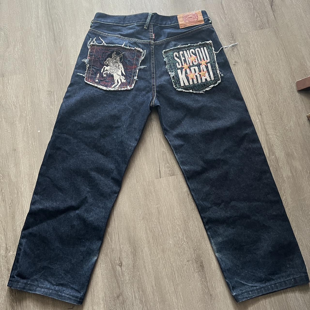 Sick pair of Martin Ksohoh red monkey jeans 34x30 in... - Depop