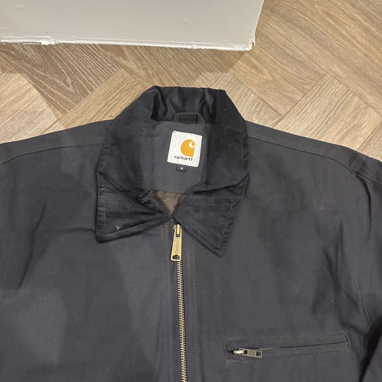 Carhartt rework black jacket Medium P2P 22 inches... - Depop