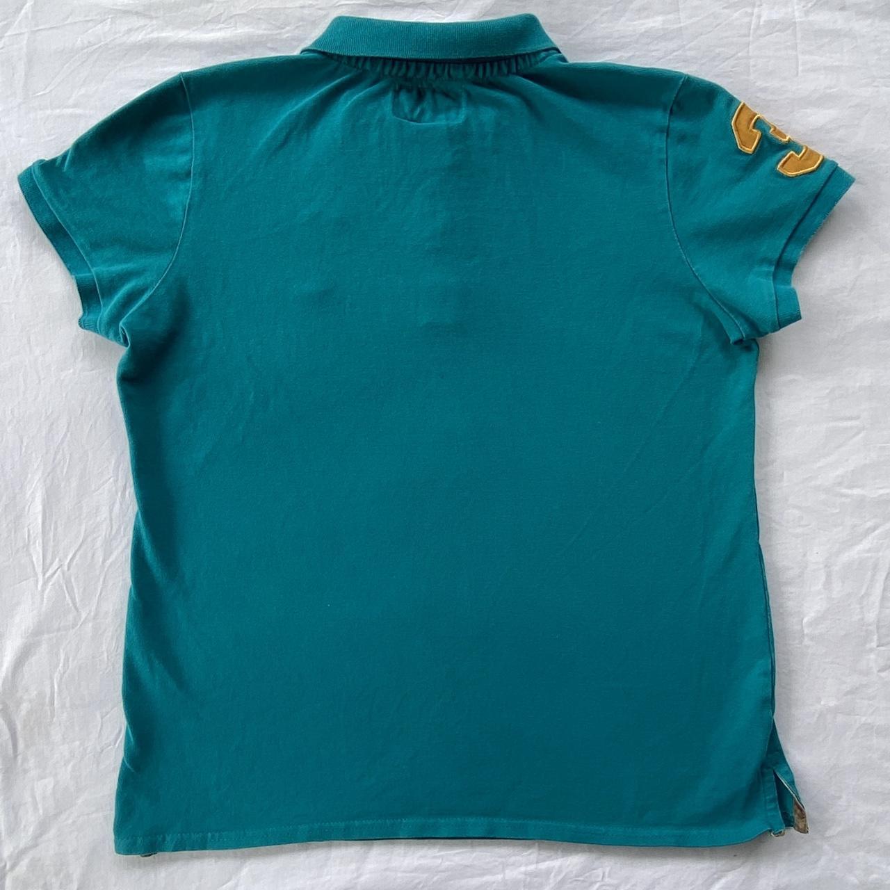 number 3 teal polo small in men’s medium in women’s... - Depop