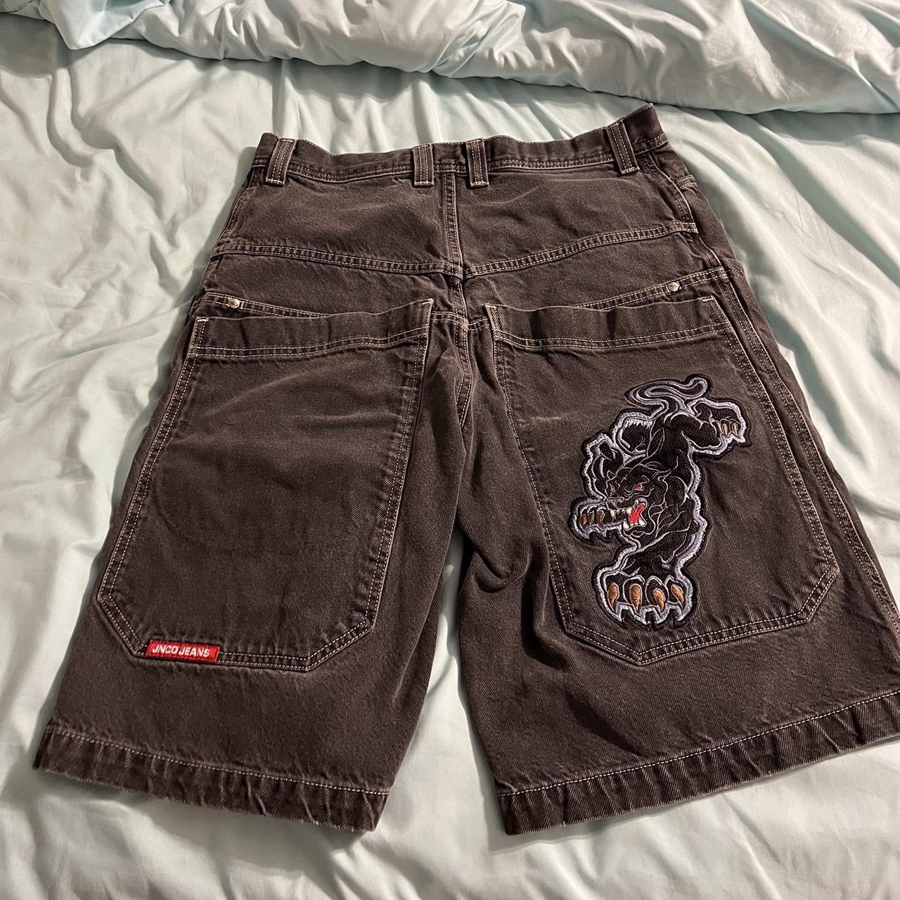 black panther blue outline jnco jorts, waist 32,... - Depop