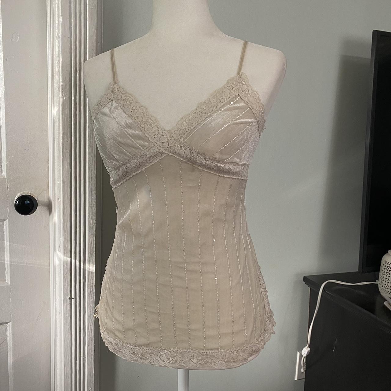 A beautiful crème cami top. Slits up the sides,... - Depop