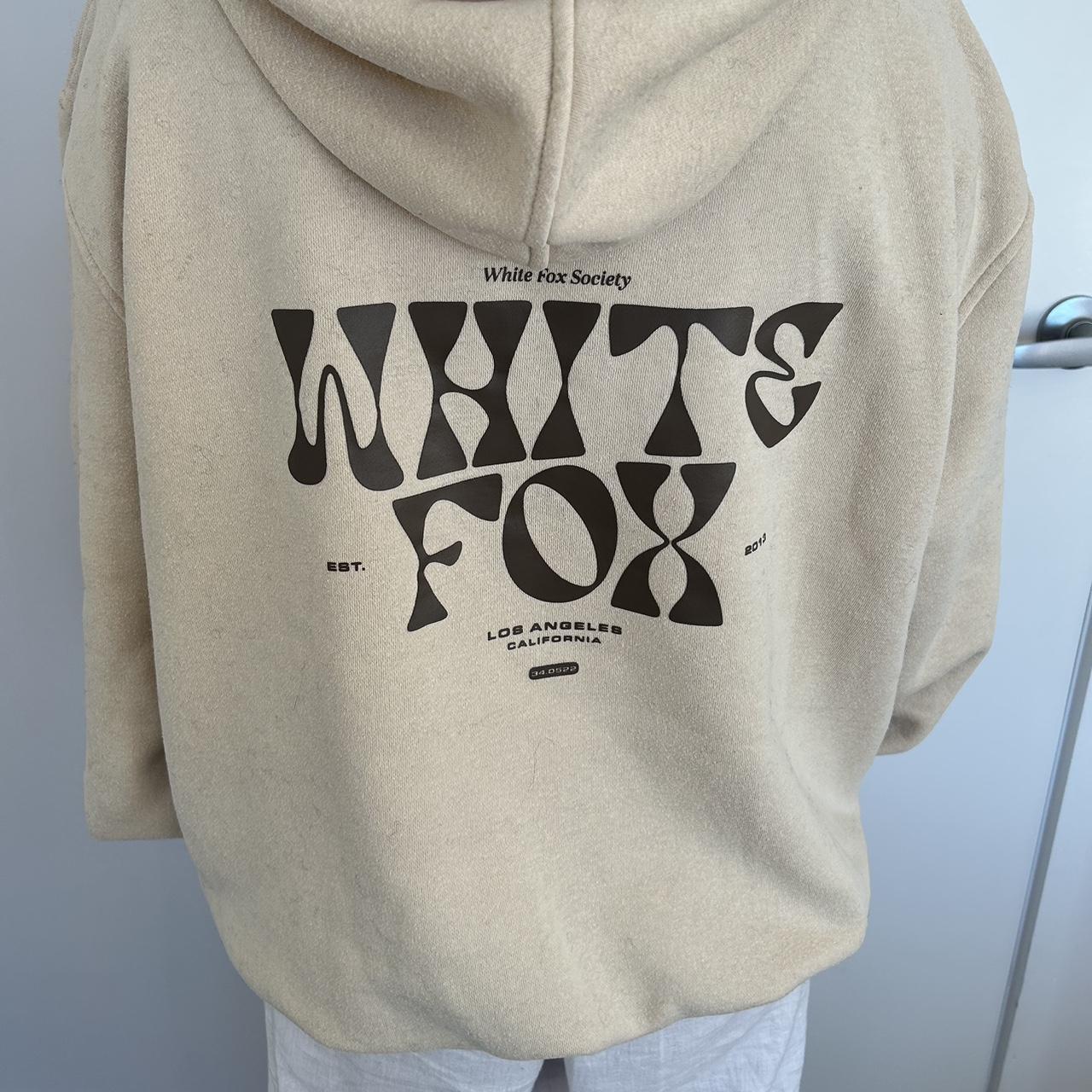 White fox jumper. Would fit a range of sizes.... - Depop