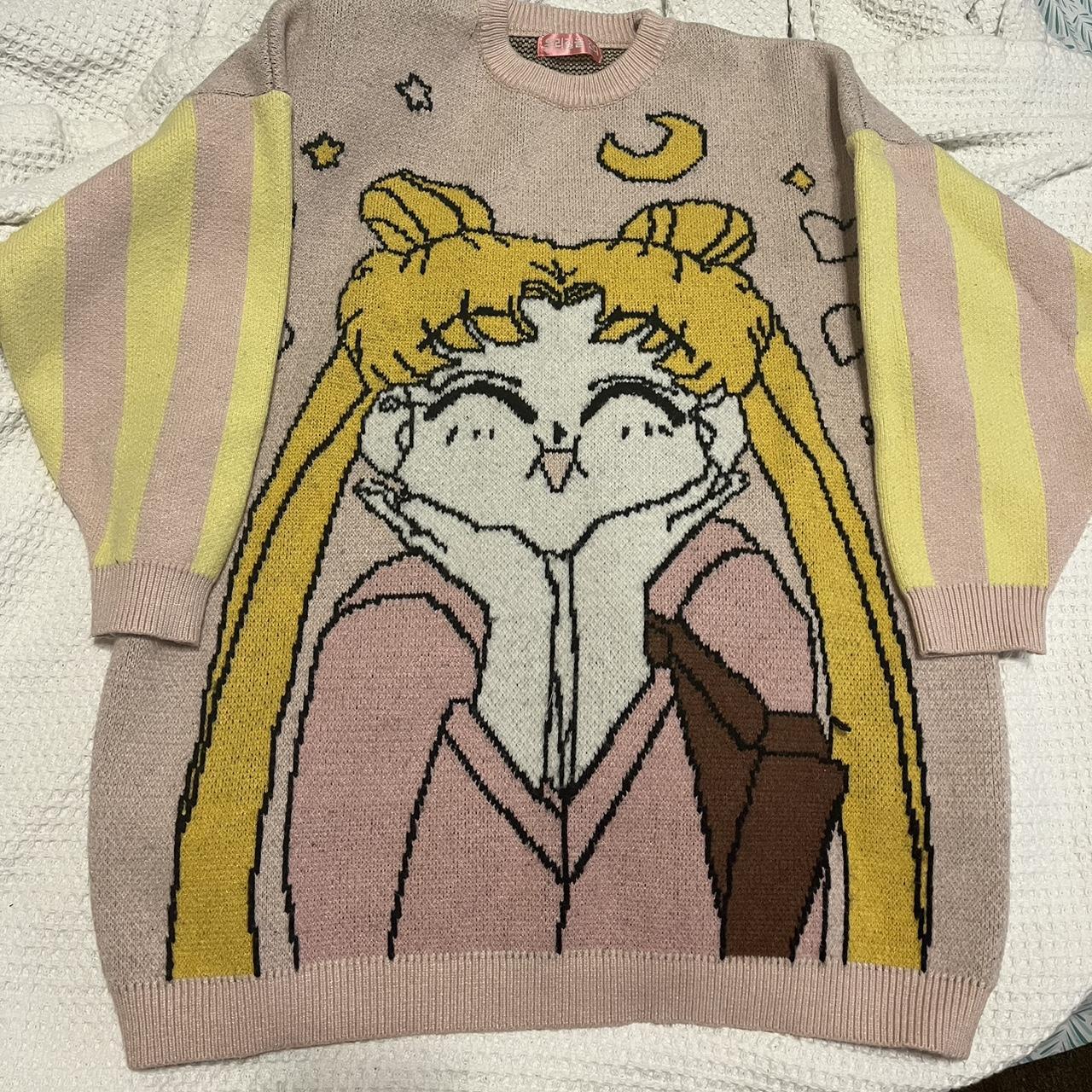 This is a sailor moon sweater that is oversize fit.... - Depop
