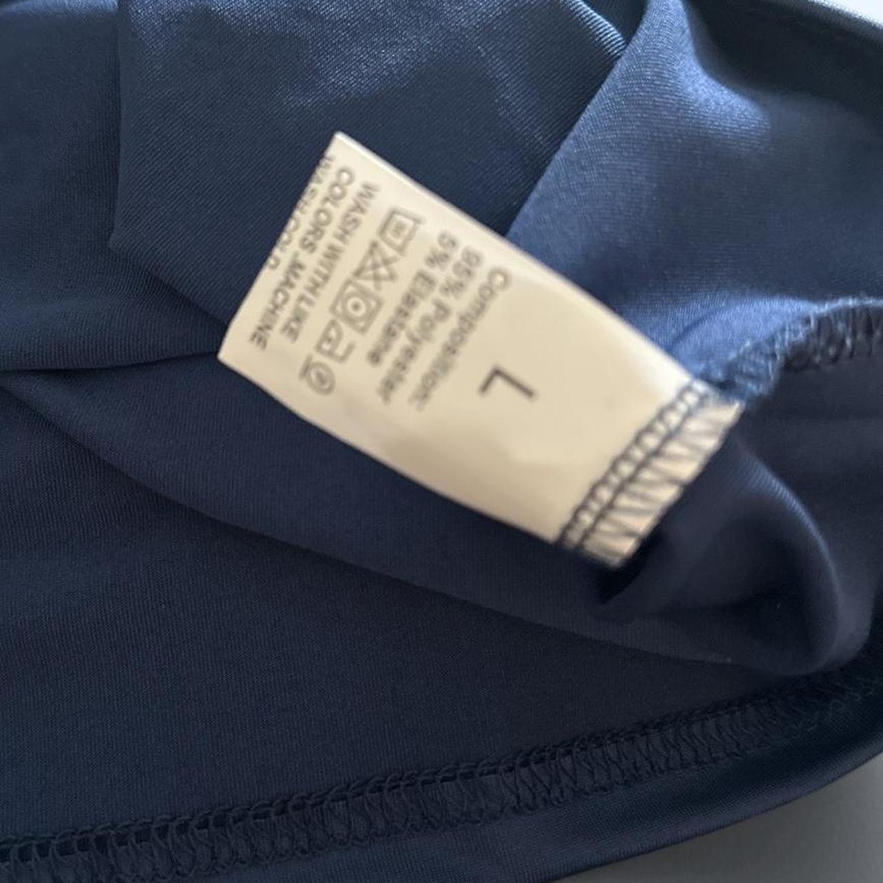 Navy blue tube top with white star design... | Depop