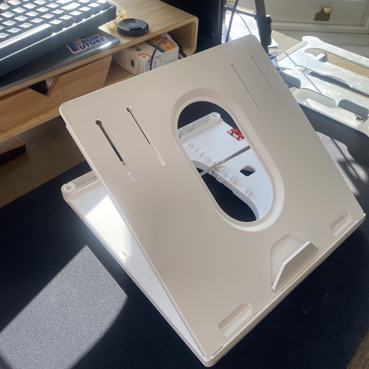 Adjustable white laptop stand. Plastic - Depop
