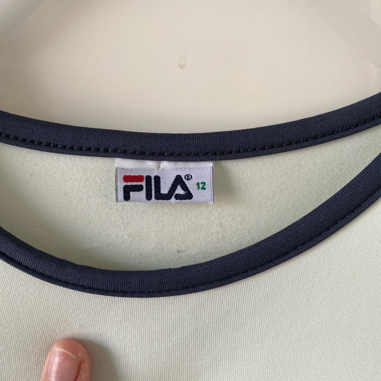 Fila mint green / light blue lycra sports top with... - Depop