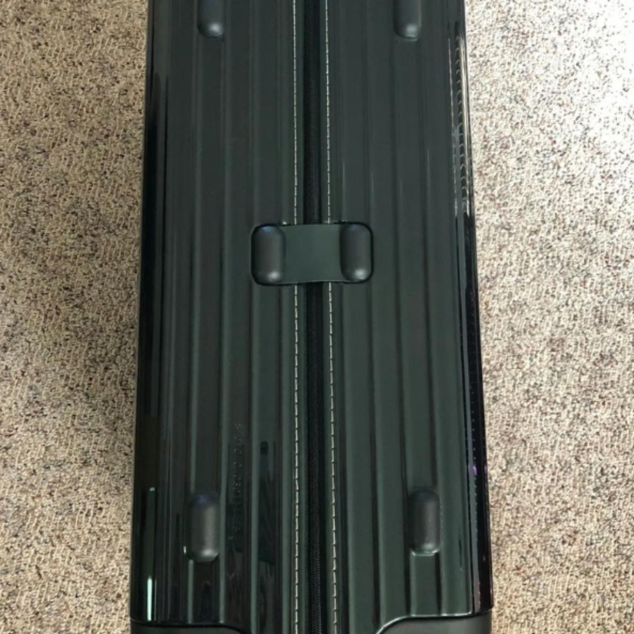 Rimowa Bossa Nova MW70 suitcase - Multiwheel® system... - Depop