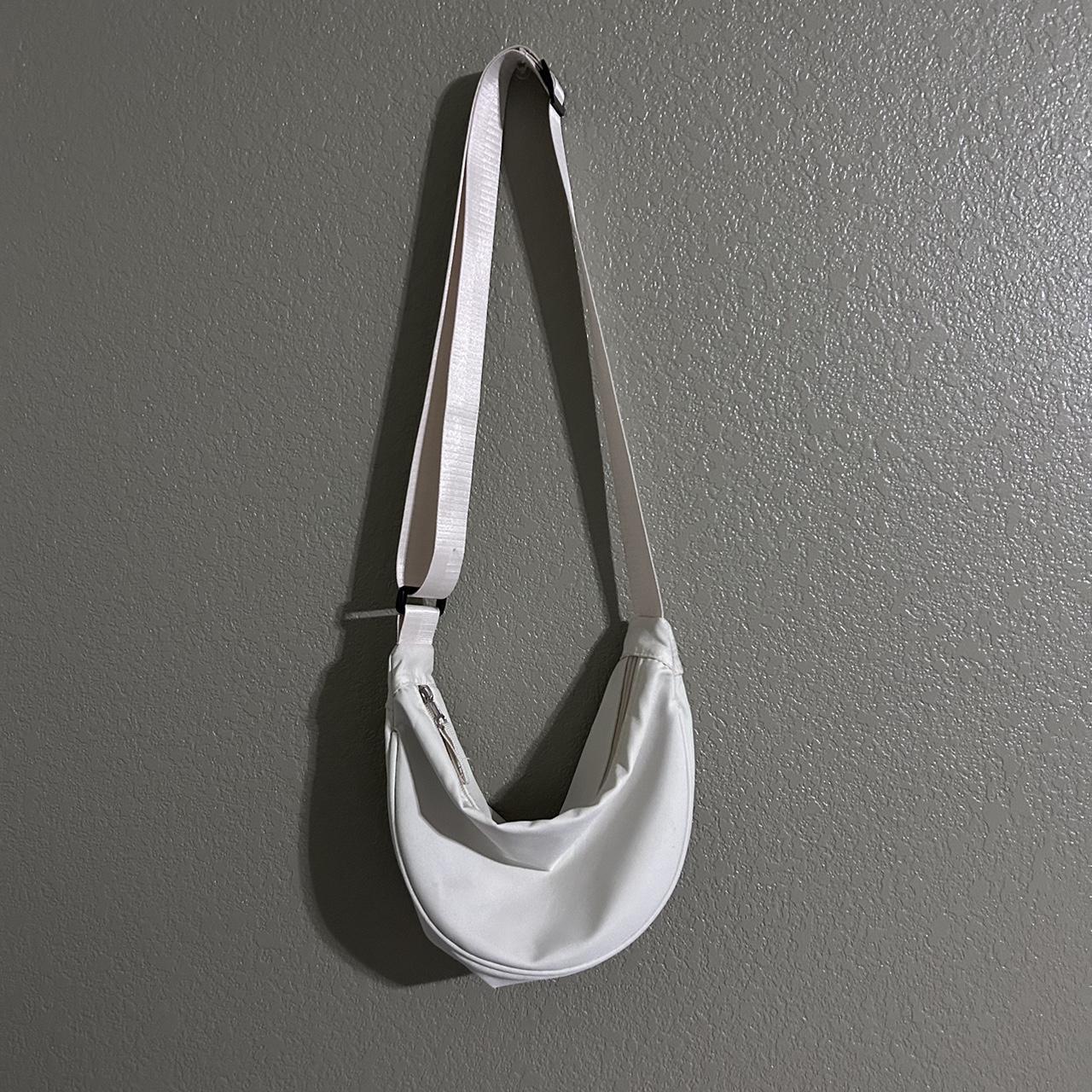 crescent moon shaped bag ( similar to Uniqlo but has... - Depop