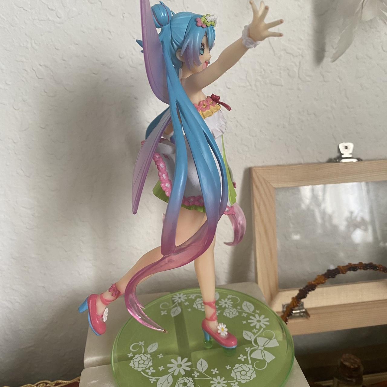 Spring Miku Figure ! Comes with box, she is missing... - Depop