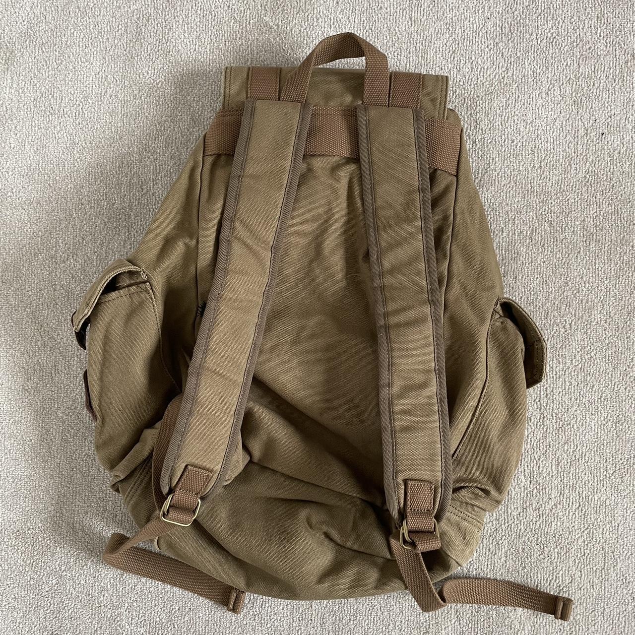 Army green canvas cargo backpack. Durable, spacious,... - Depop