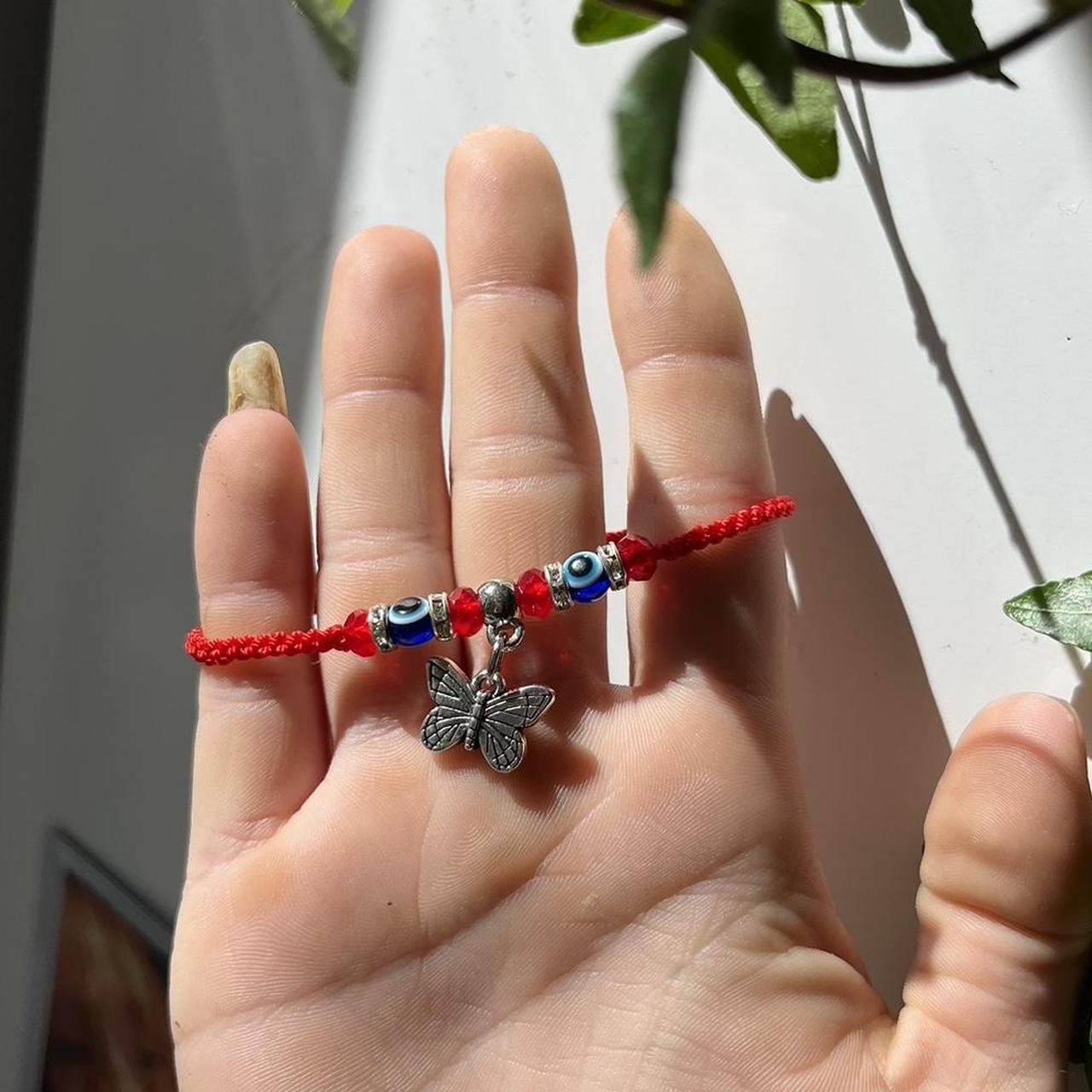 Red evil eye & butterfly bracelet / anklet (size is... - Depop