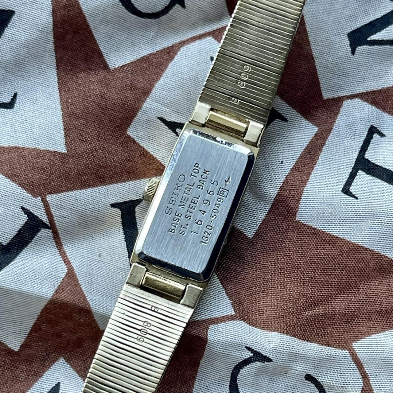 sleek smooth Seiko watch with a thin rectangle case... - Depop