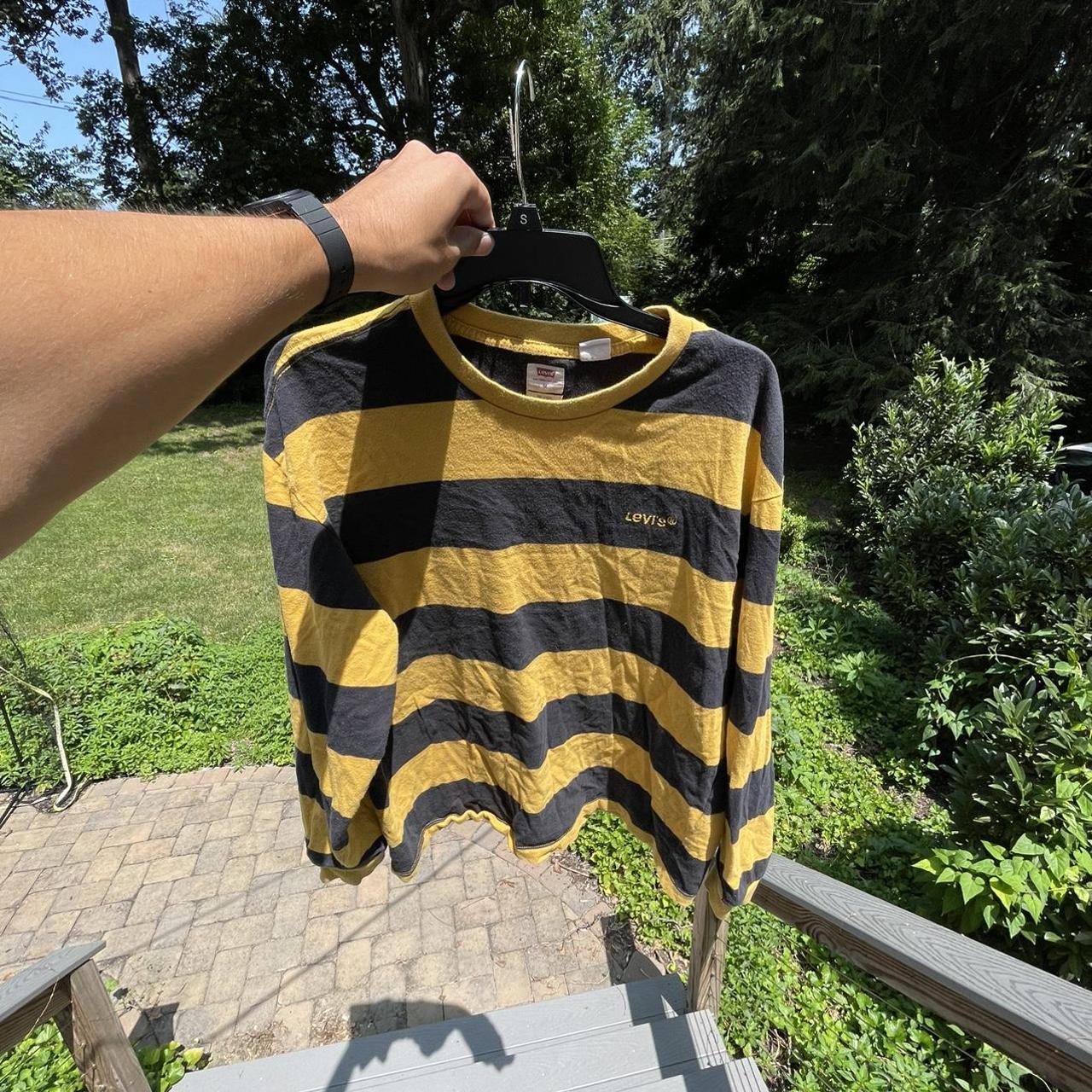Levi’s black and yellow rugby shirt, size medium but... - Depop