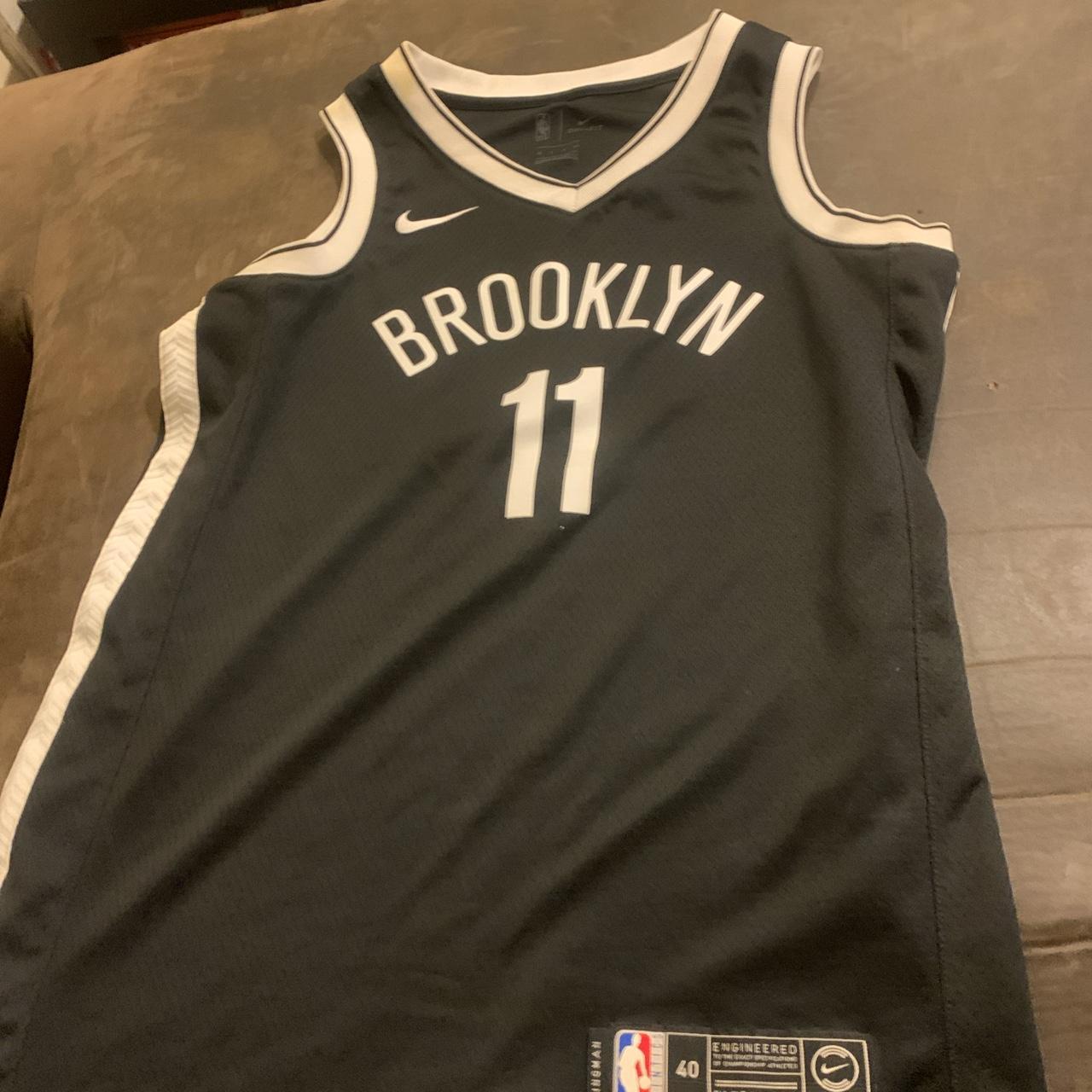 NBA Men's Black Top | Depop