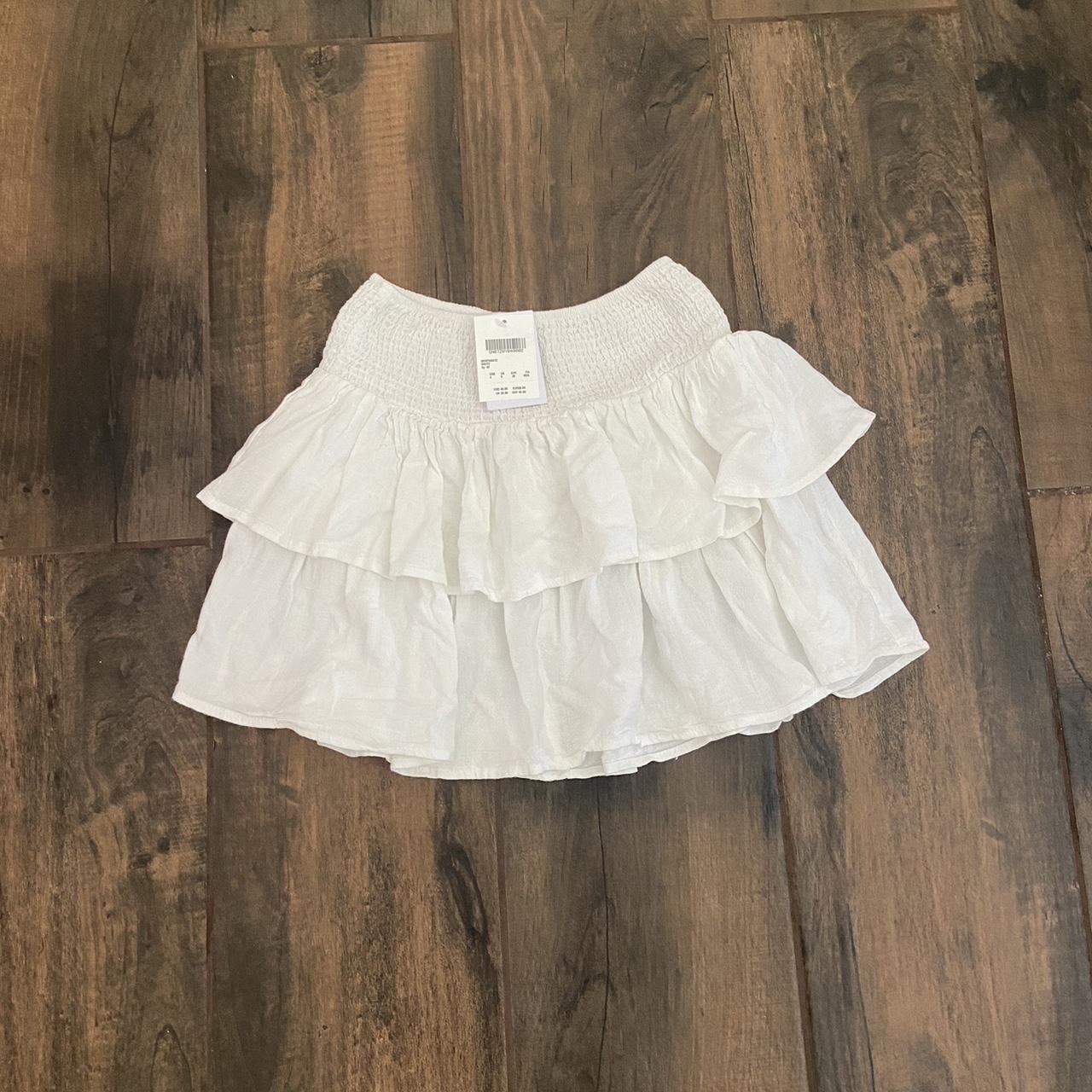 Subdued white ruffle skirt🌼brand new with tag... - Depop