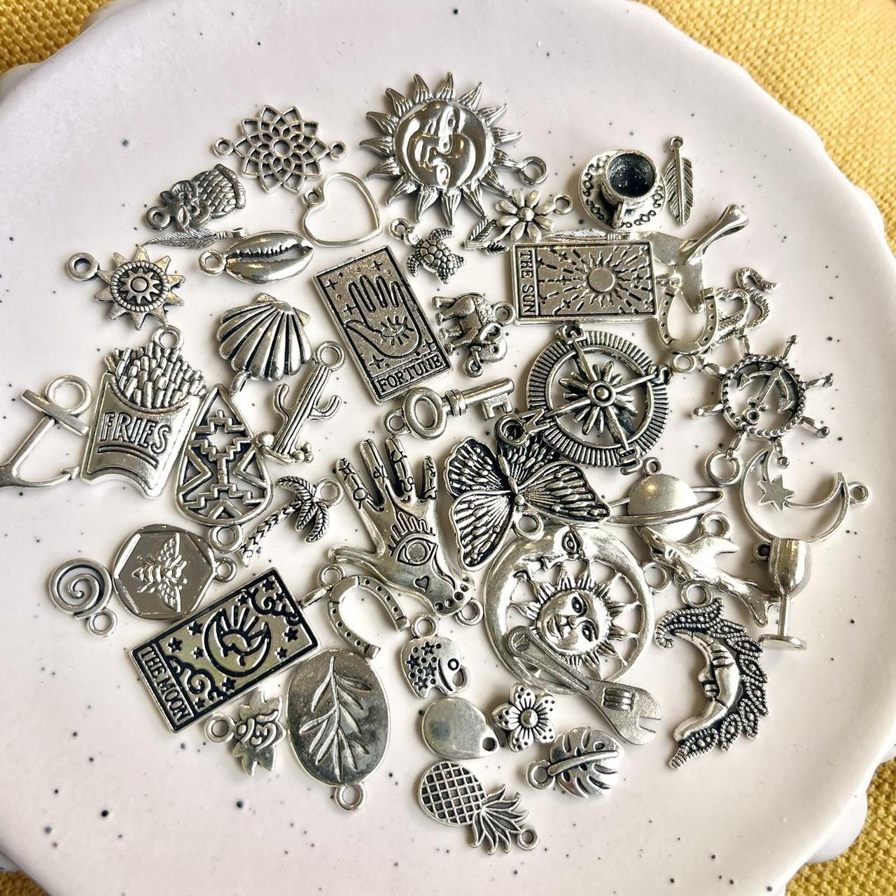 Small bag of RANDOM charms 🦋🌙 🌸🌴 Approx 25 charms... - Depop