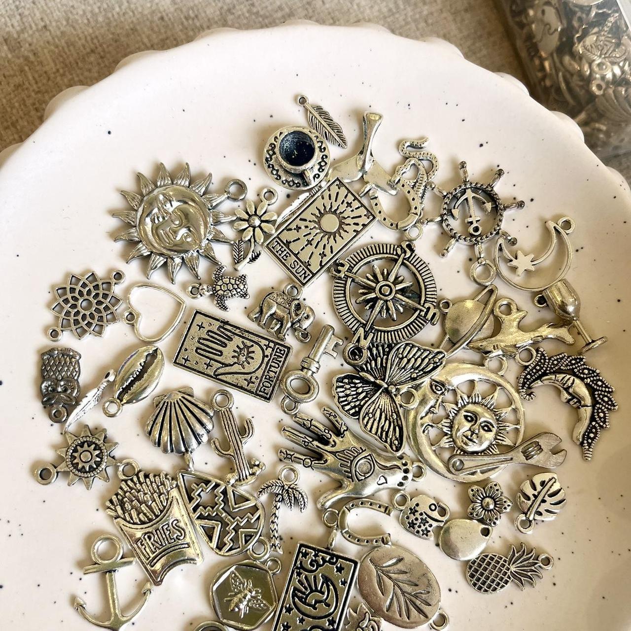 Small bag of RANDOM charms 🦋🌙 🌸🌴 Approx 25 charms... - Depop