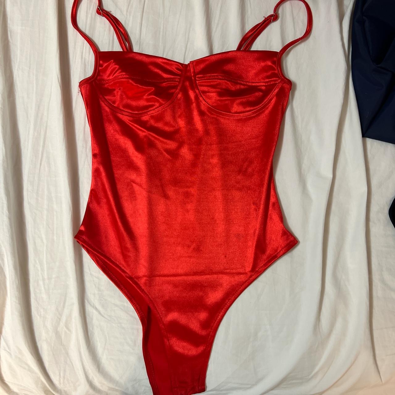 Bright red adika body suit! Size small Fabric got... - Depop