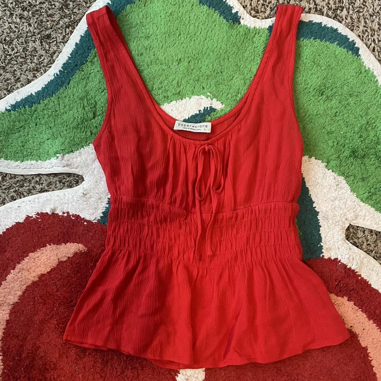 Cute Red tank top with a tie in the front Size... | Depop