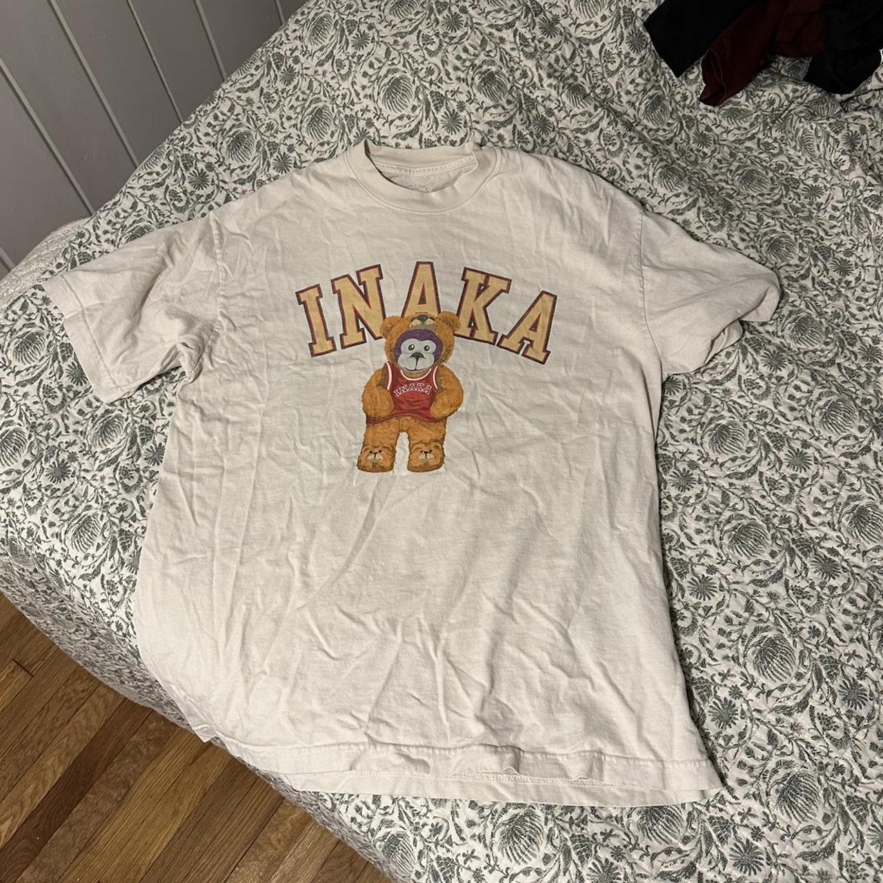 description: inaka power t shirt size:... - Depop