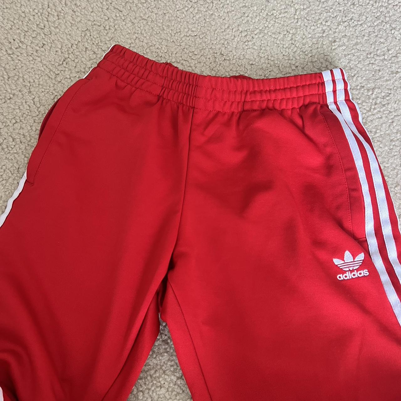 Red adidas tracksuit pants - Depop