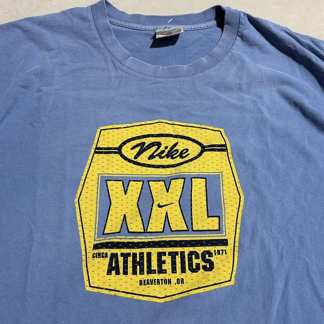 Vintage 90’s Nike XXL Athletics Graphic Logo T Shirt... - Depop