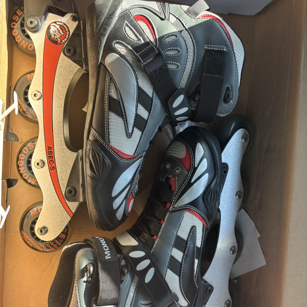 Mongoose black and red rollerblades... - Depop