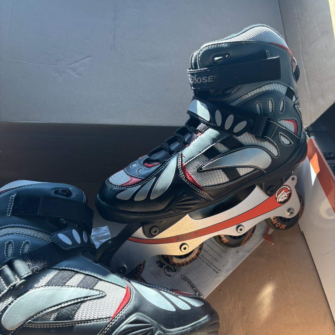 Mongoose black and red rollerblades... - Depop