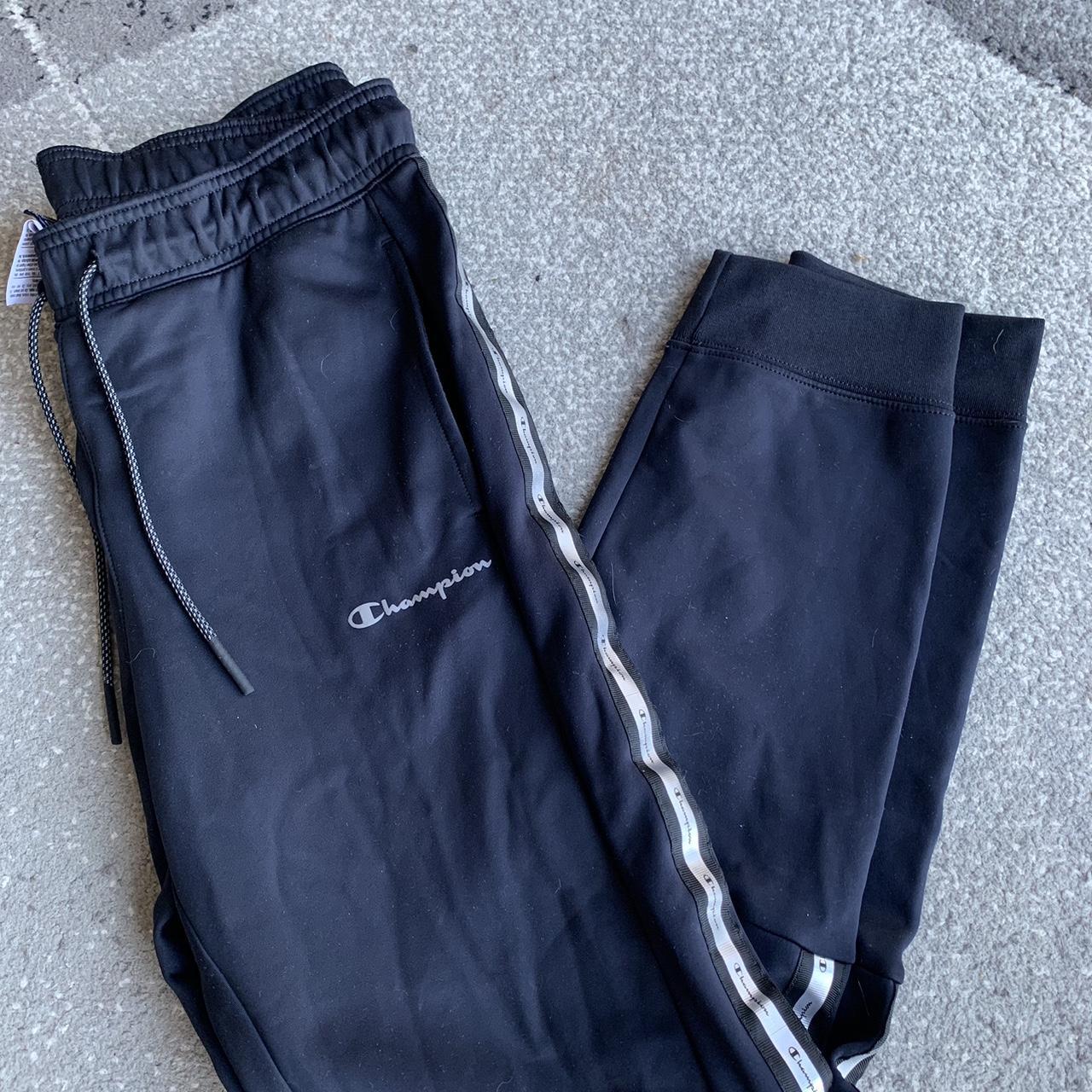Champion fleece joggers, trackies with logo... - Depop