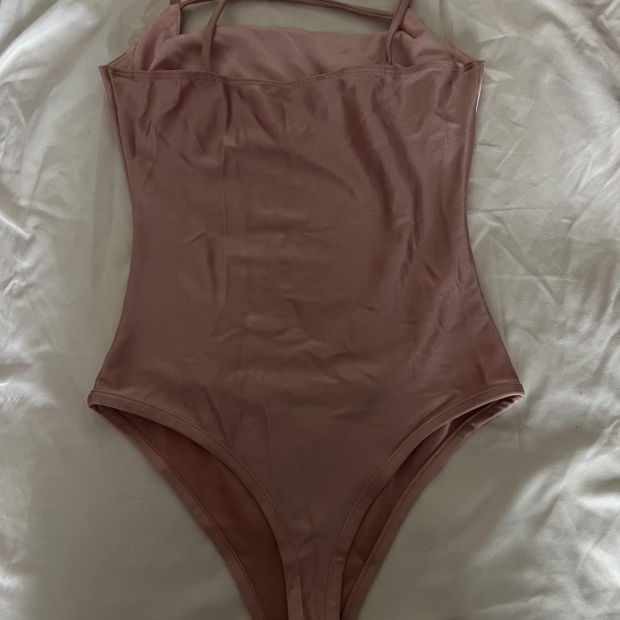 the cutest pink bodysuit! size s in amazing... - Depop