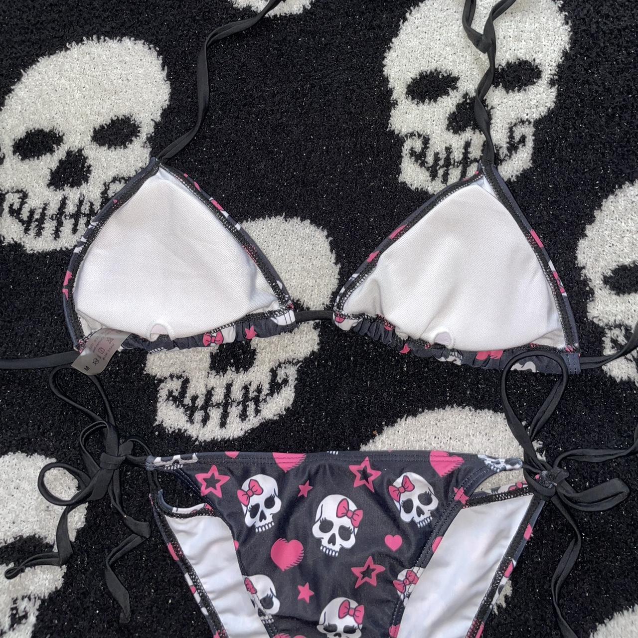 Never worn black and pink skull bikini set// padded... | Depop