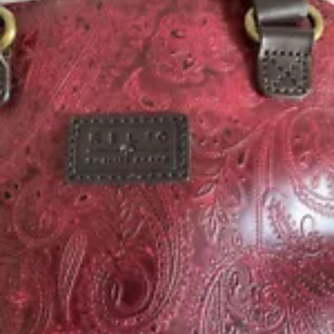 This Relic crossbody purse features a vibrant red... - Depop