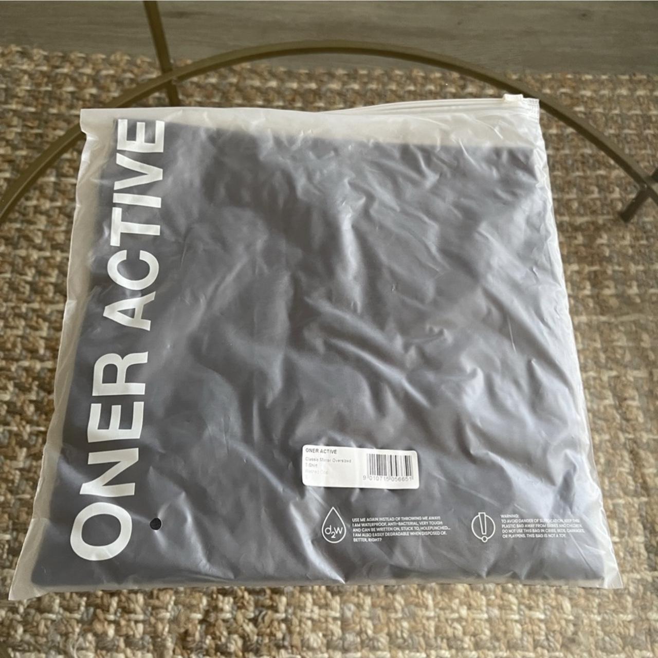 oner active classic mirror oversized t-shirt in... - Depop
