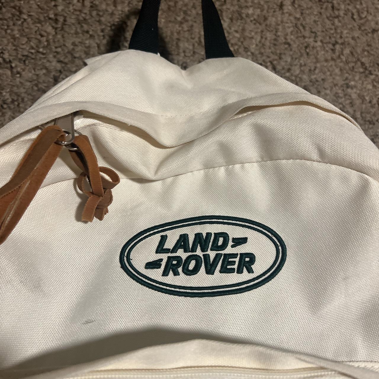 Super dope cream Land Rover backpack, some dirt on... - Depop