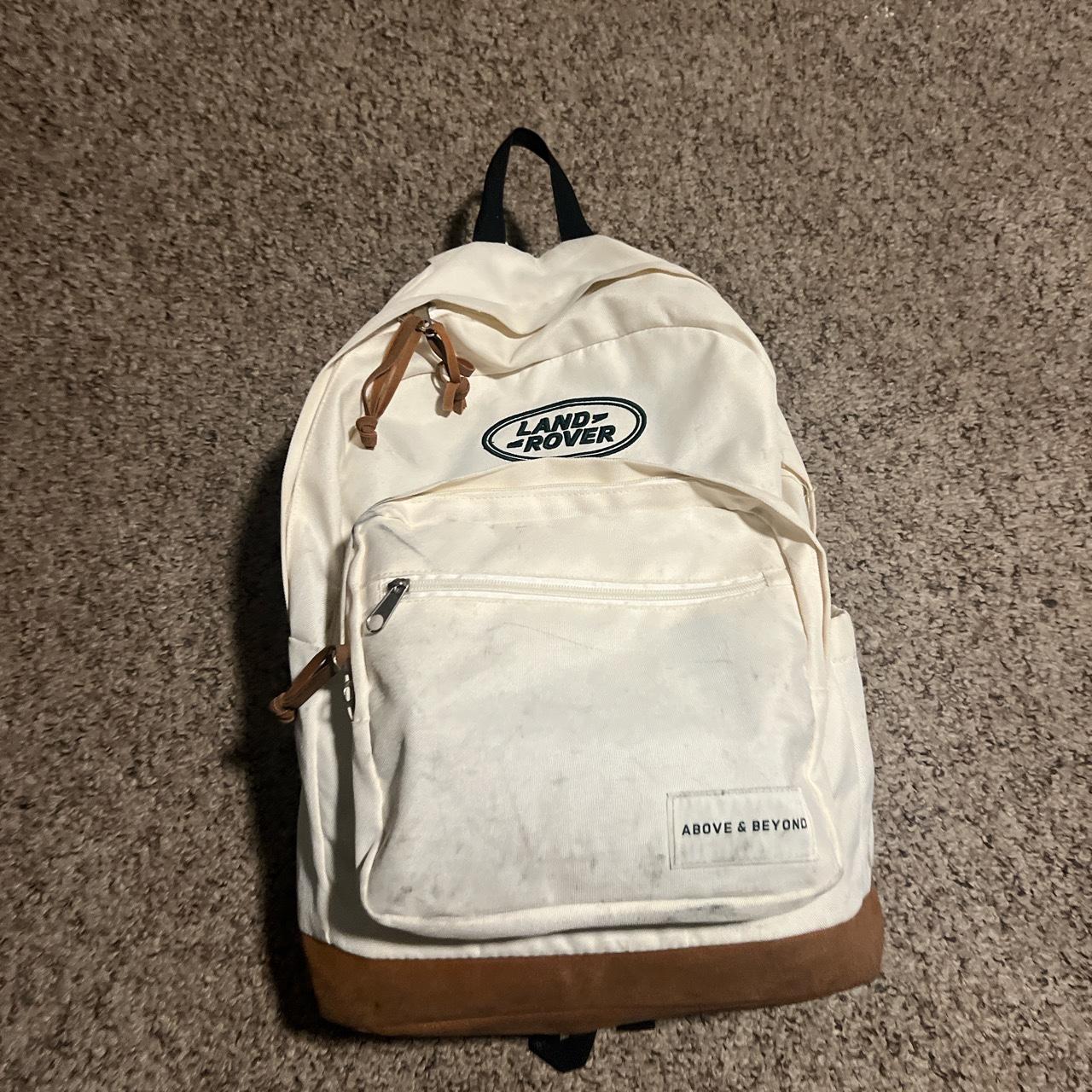 Super dope cream Land Rover backpack, some dirt on... - Depop