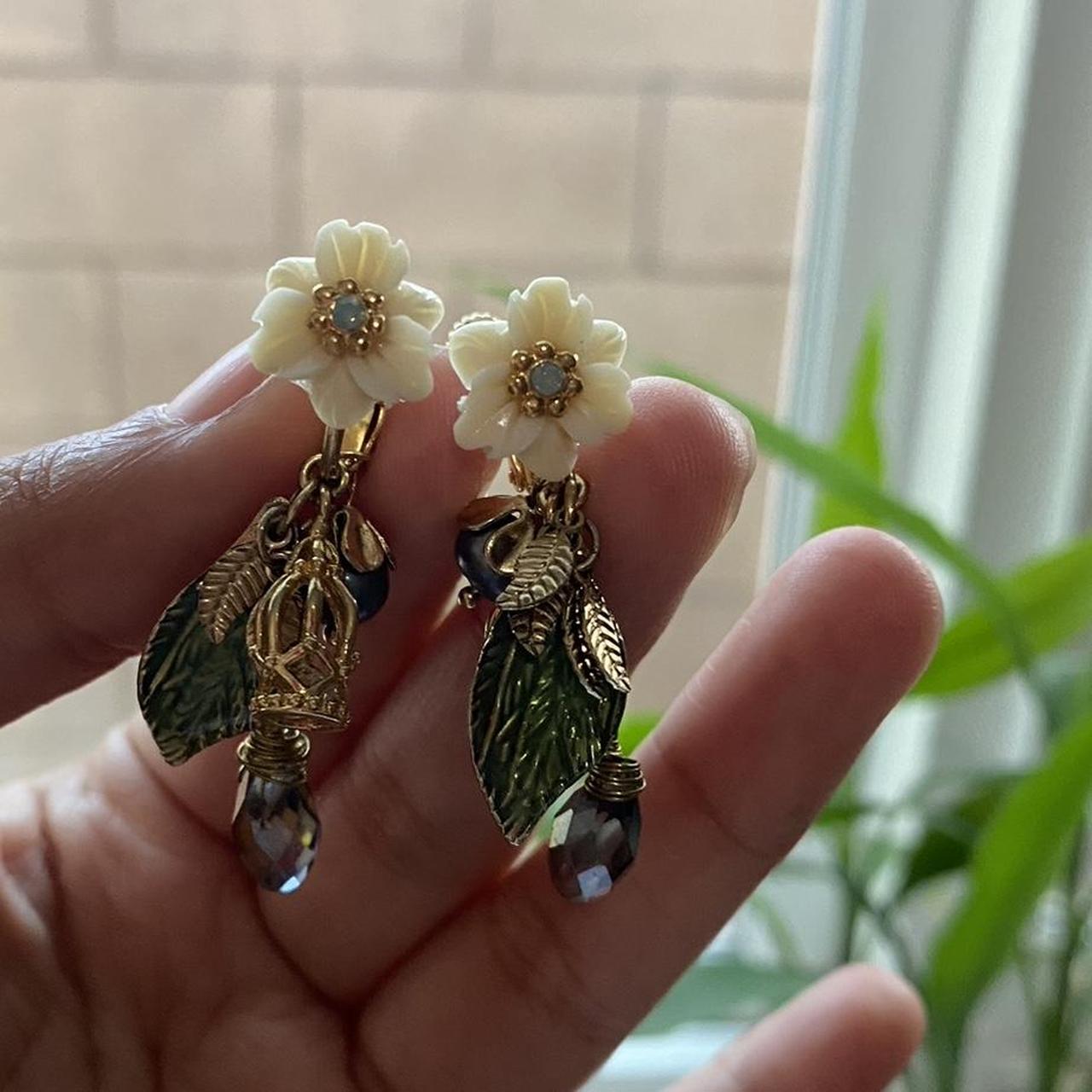 Clip on White and gold flower dangly earrings with... - Depop