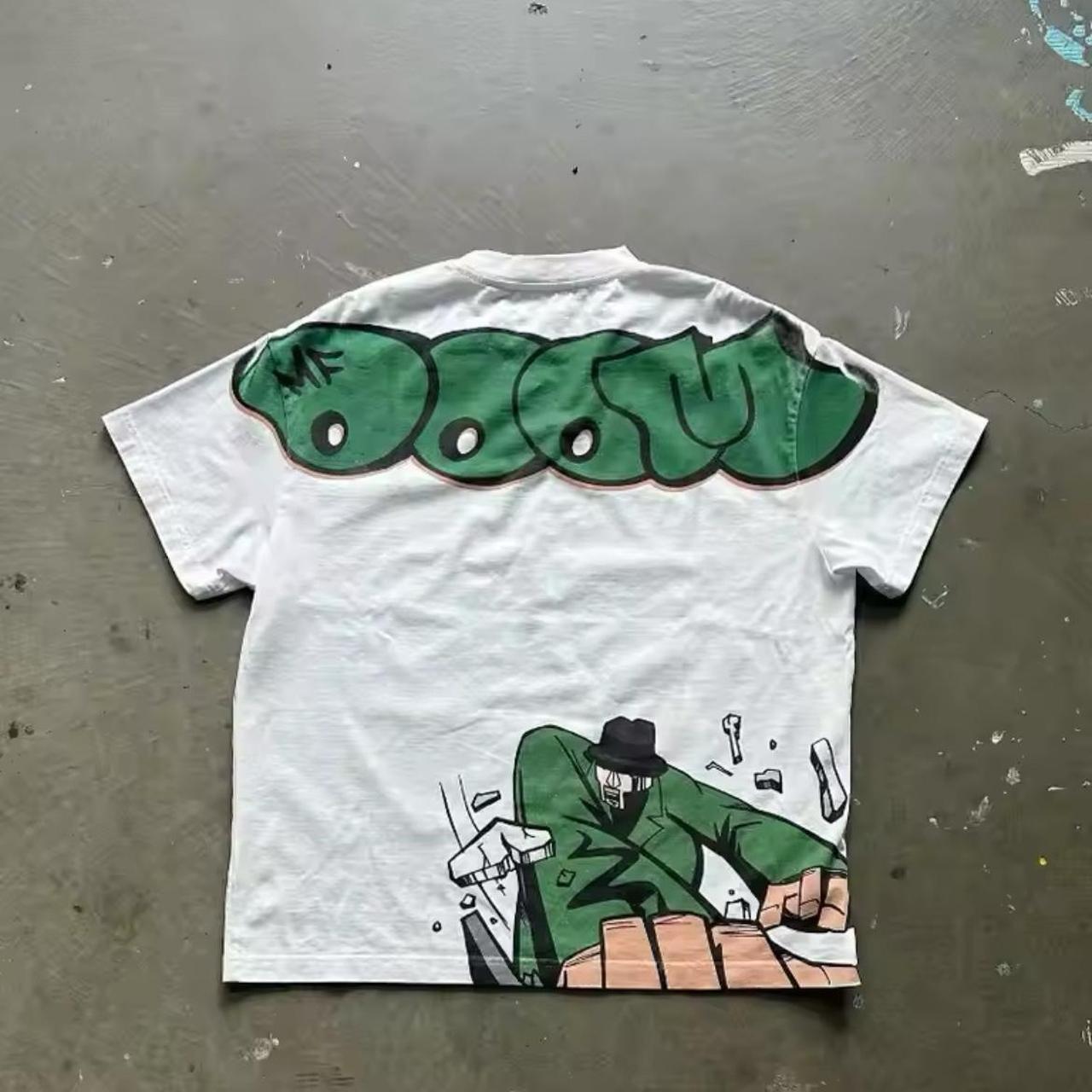 The Illest Villain MF Doom white and green tee Cool... - Depop